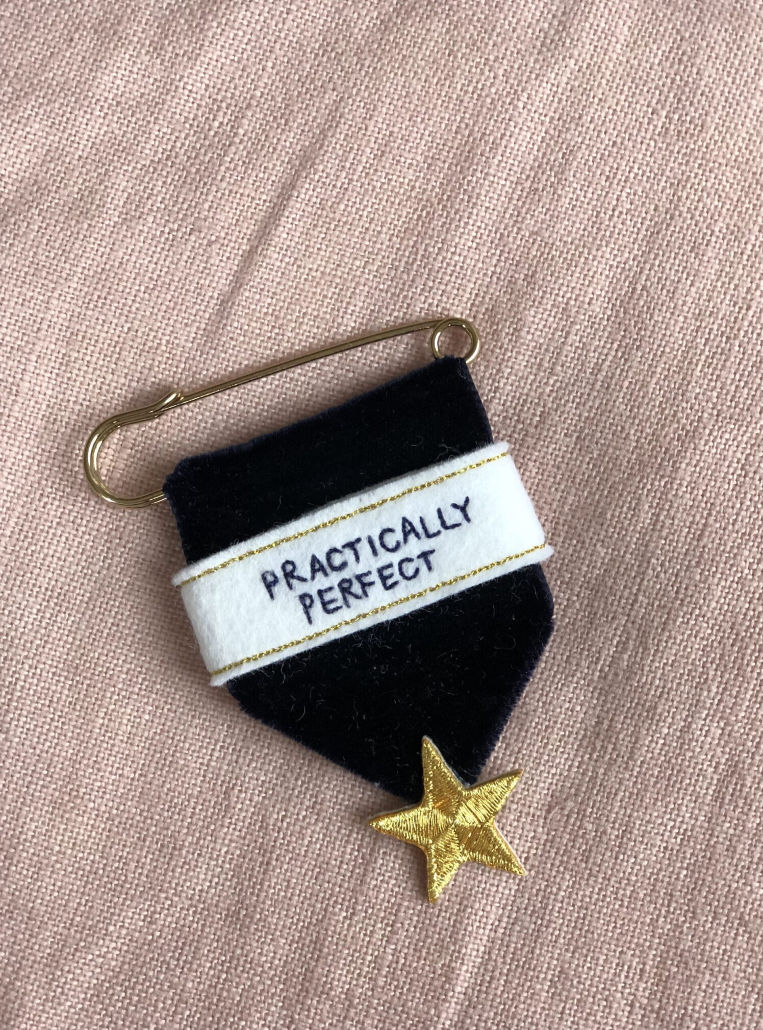 Embroidered medal - practically perfect - Emma Giacalone Textiles